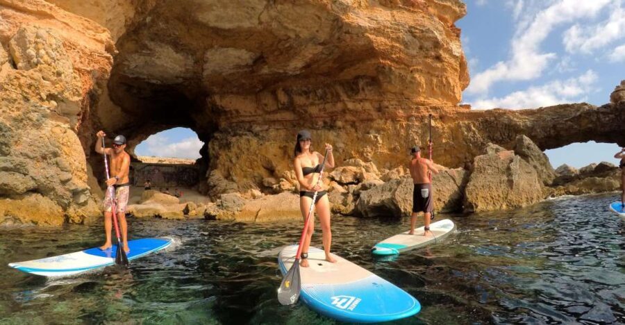 Ibiza: SUP & Snorkel Boat Tour with Caves, Drinks & Photos